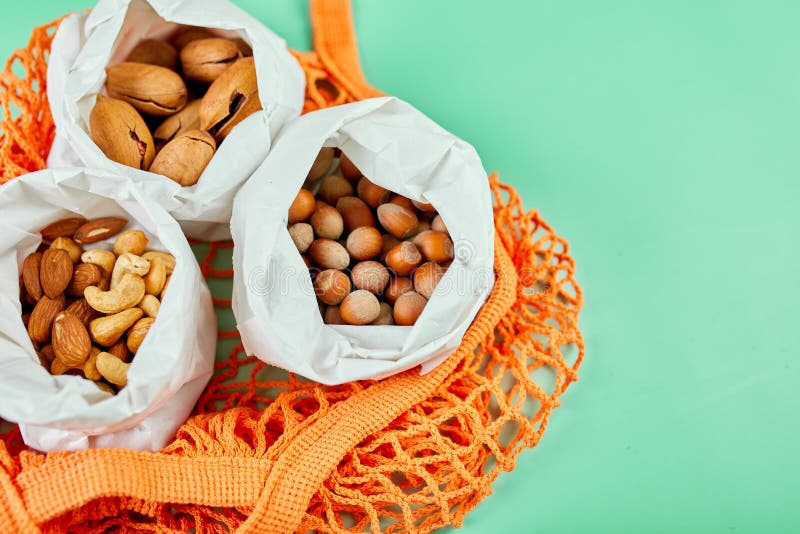Top View of Various Sort of Nuts on the Table in a Paper Bag in ...