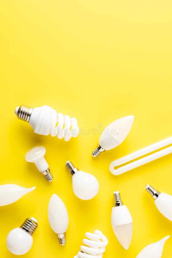 Top View of Various Types of Lamps on Yellow Background Stock Image ...