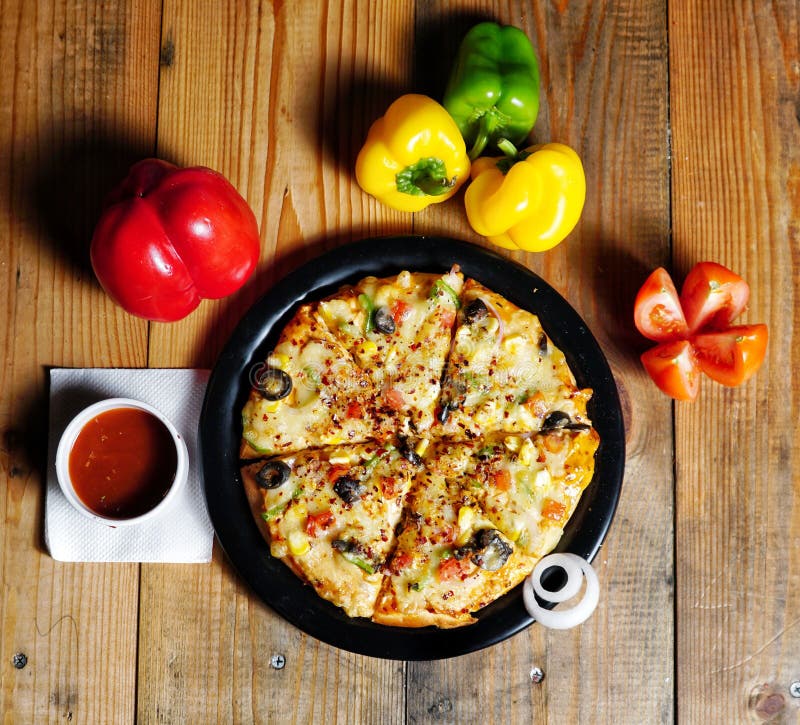 Top View of a Vegetable Pizza Surrounded with Fresh Vegetables Stock ...