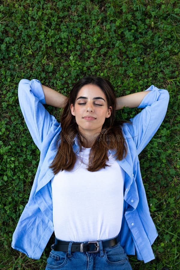 Top View Vertical Portrait Of Serene Relaxed Young Brunette Woman