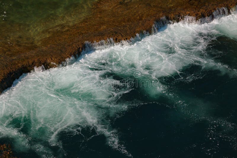 Top View of Very Low but Wide Waterfall with Deep Turquoise Colored ...