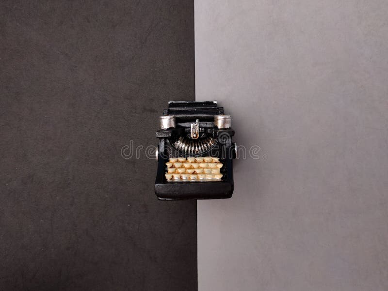 Top View of a Vintage Black Typewriter on a Black and Gray Background ...