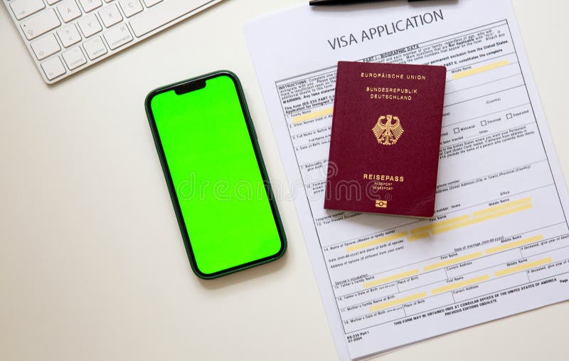 Top View of a Visa Application Document with a German Passport and a ...