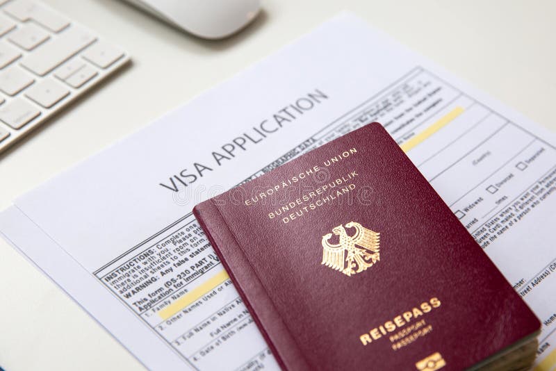 Top View of a Visa Application Document with a German Passport Stock ...