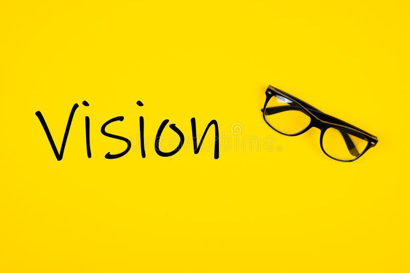 Top View of Vision Written on Yellow Background with Glasses Stock ...