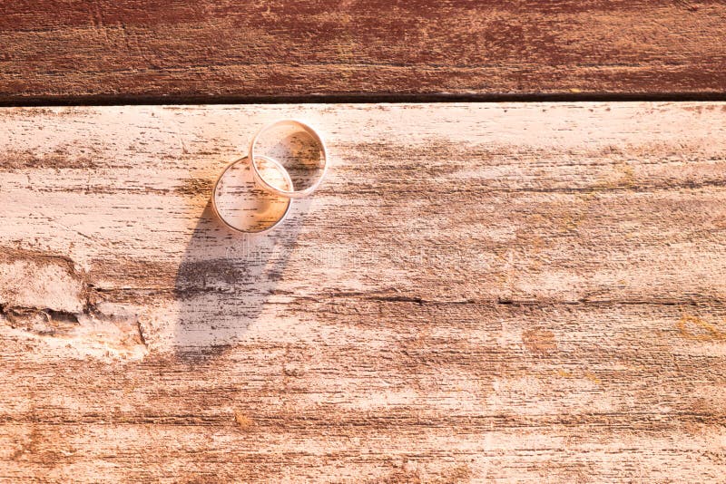 Top View and Warm Tone. Two Silver Ring Putting on Wooden are Ba Stock ...