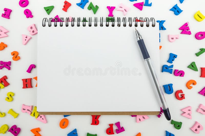 Top View of a White Blank Notepad with a Pen and Colored English ...