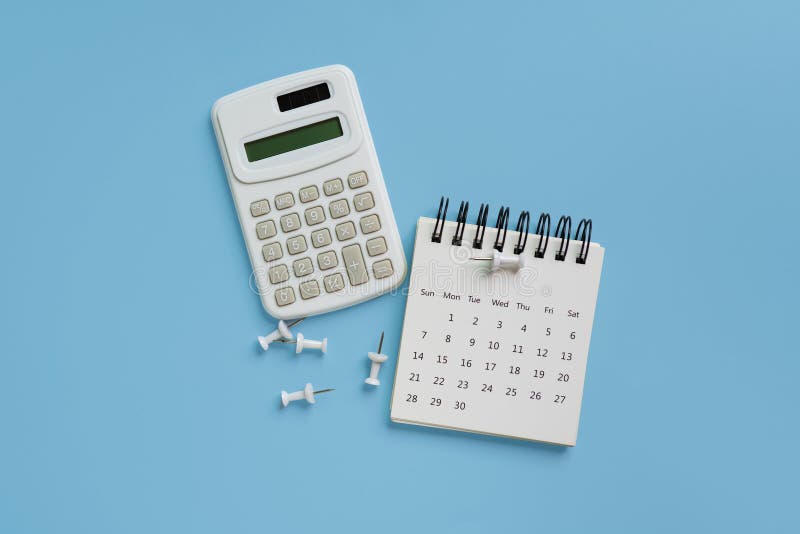 White Calendar, Calculator and Thumbtack on Blue Background Stock Image ...