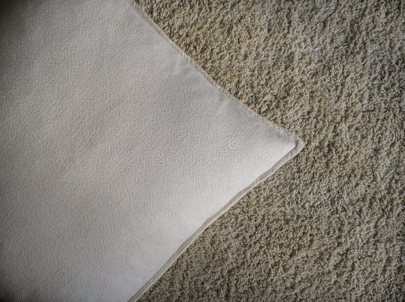 Top View of White Cushion on Beige Carpet. Stock Image - Image of ...