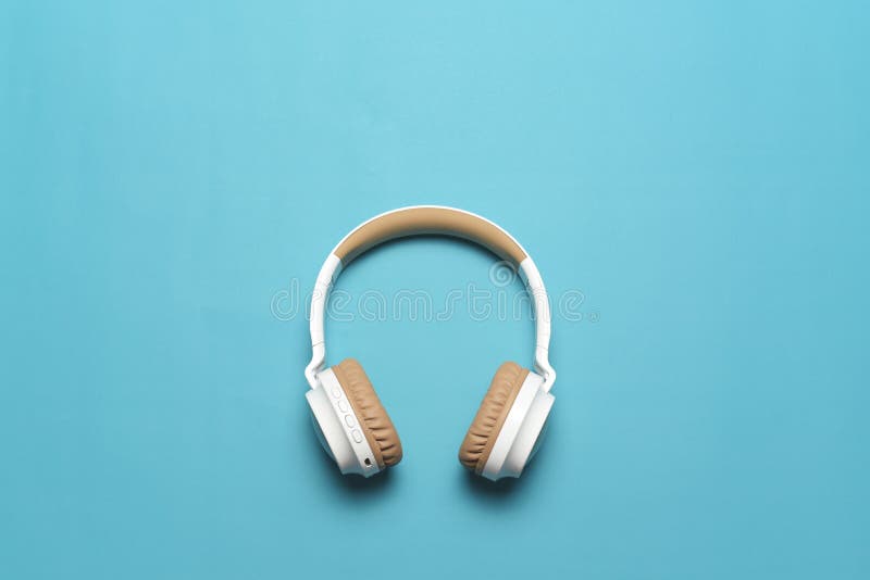 Top View of White Headphones on Blue Background with Copy Space Stock ...