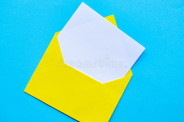 Top View of White Notepad with Envelope on Blue Cover Background with ...
