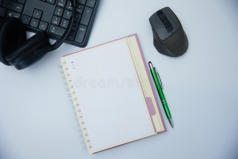 Top View of a White Office Desk with a Notebook Stock Photo - Image of ...
