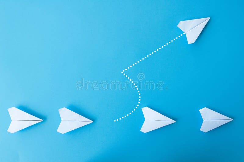 Top View of White Paper Airplanes Origami with One Flying at Different ...
