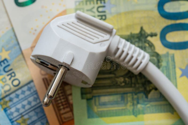 Top View of a White Plug Over the Euros - Electricity Inflation Concept ...