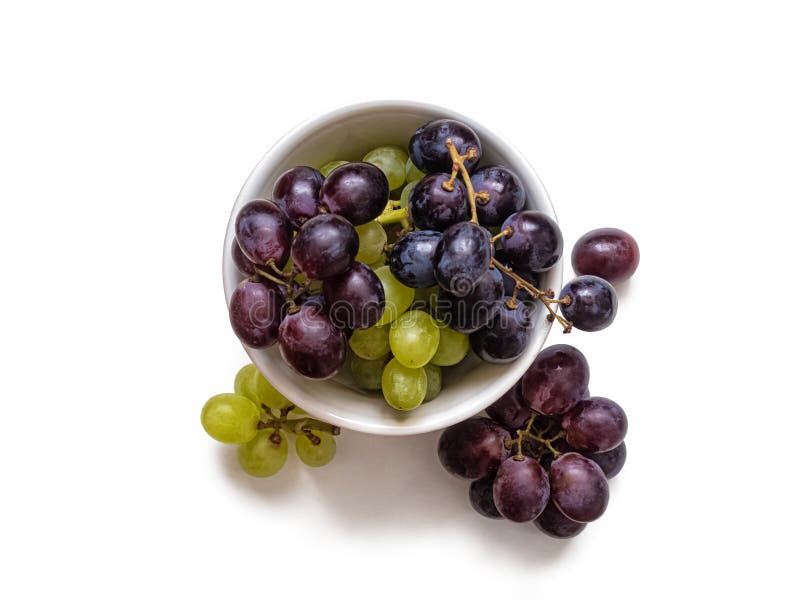 Top View of a White Porcelain Cup Filled with Red and White Grapes ...