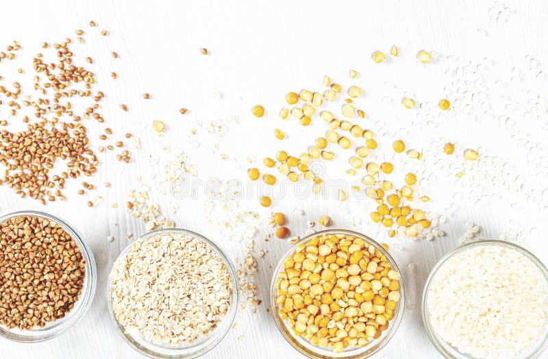 Top View of White Rice Grains with Oats and Seeds Scattered on the ...