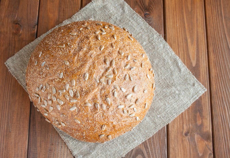 Top View Wholegrain Bread on a Wooden Table. Stock Image - Image of ...