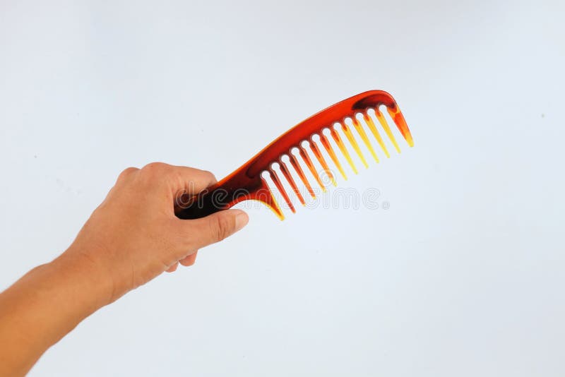 Top View Woman Hand Holding Brown Comb Isolate on a White Background ...