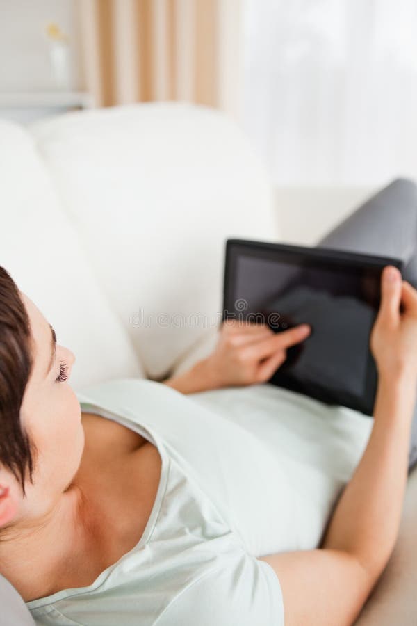 Woman on Couch with IPad Tablet Wireless Computer Editorial Stock Image ...