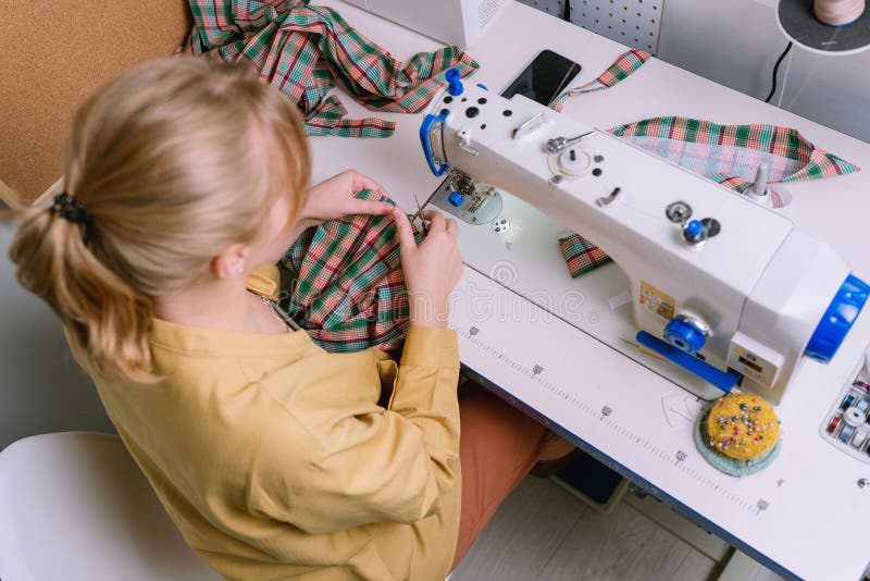 Top View of Woman Working with Sewing Machine in Her Workshop Stock ...