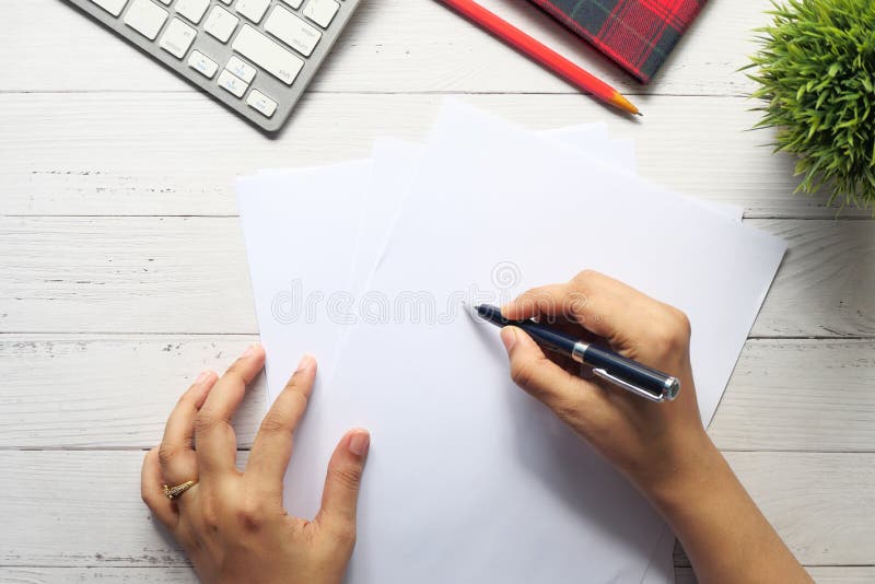 Top View of Women Hand Writing on Empty Paper on Table Stock Image ...