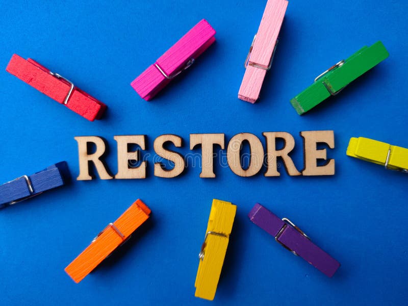 Top View Wooden Clips and Wooden Word with Text RESTORE Stock Image ...