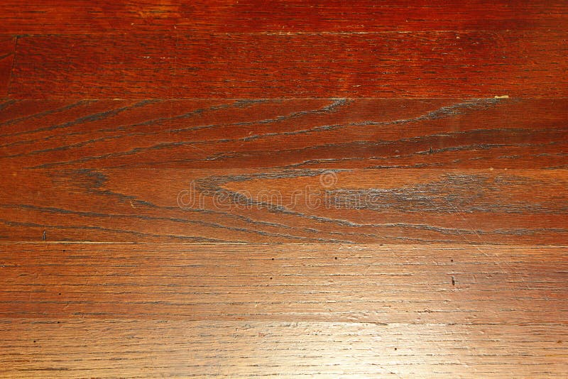 Top View of a Wooden Laminate Flooring with Scratches Under the Lights ...