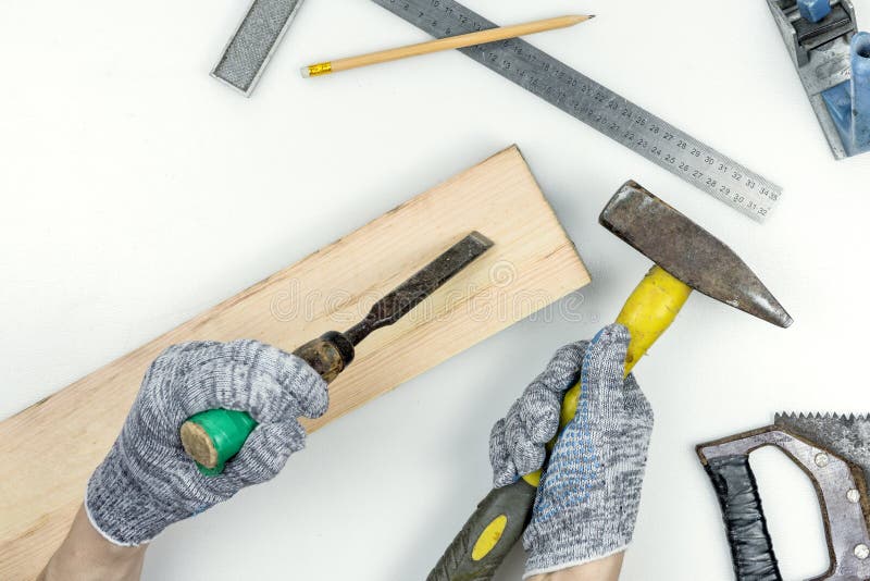 Top View of a Work Table in a Carpentry Workshop. Hands in Gloves Hold ...