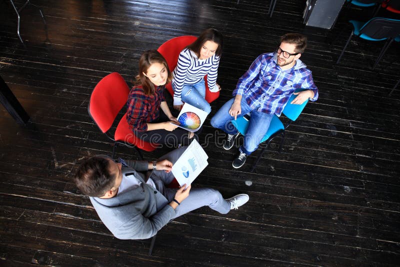 Top View of Working Business Group Sitting at Table during Corporate ...