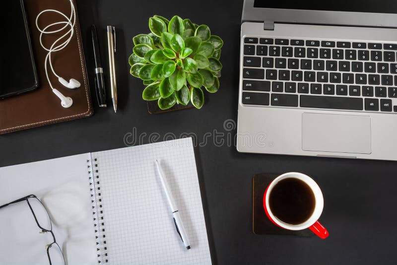 Top View of Workplace with Laptop and Other Items on Black Desktop ...