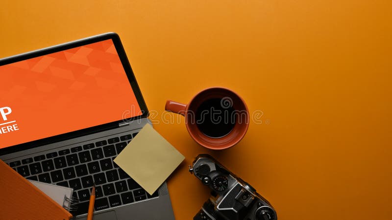 Worktable with Laptop, Camera, Stationery and Copy Space on the Table ...