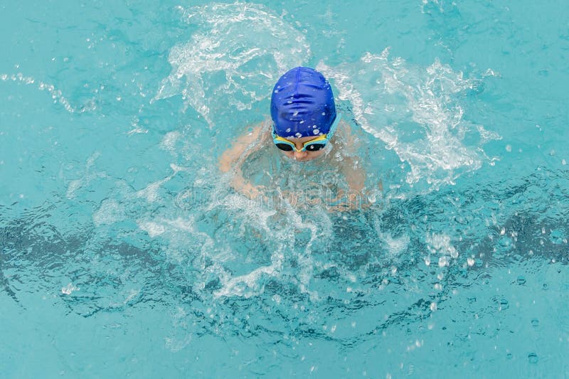 7-year Boy Swimming Backstroke in a Swimming Pool Stock Image - Image ...