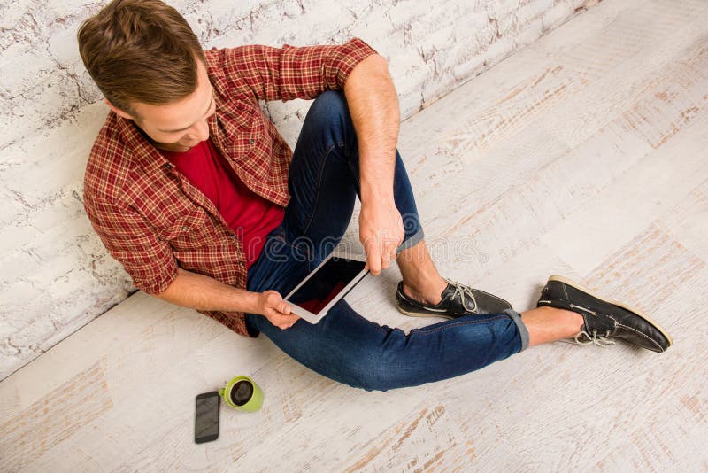 Top View of Young Man Siting on Floor with Tablet Stock Photo - Image ...