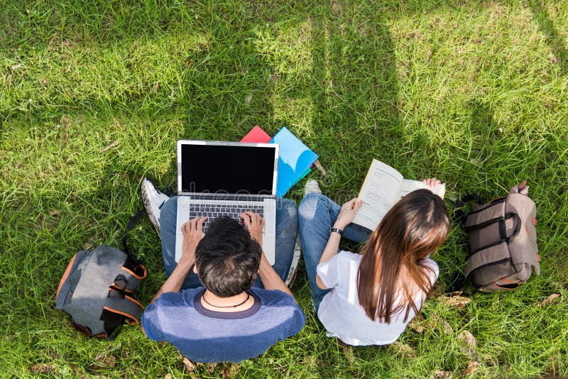Top View Young Students Sitting on Grass with Laptop and Book Stock ...