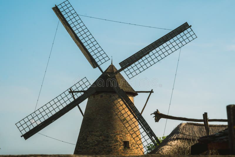 Top of a Windmill and Roofs of Houses in a Rural Area Stock Photo ...