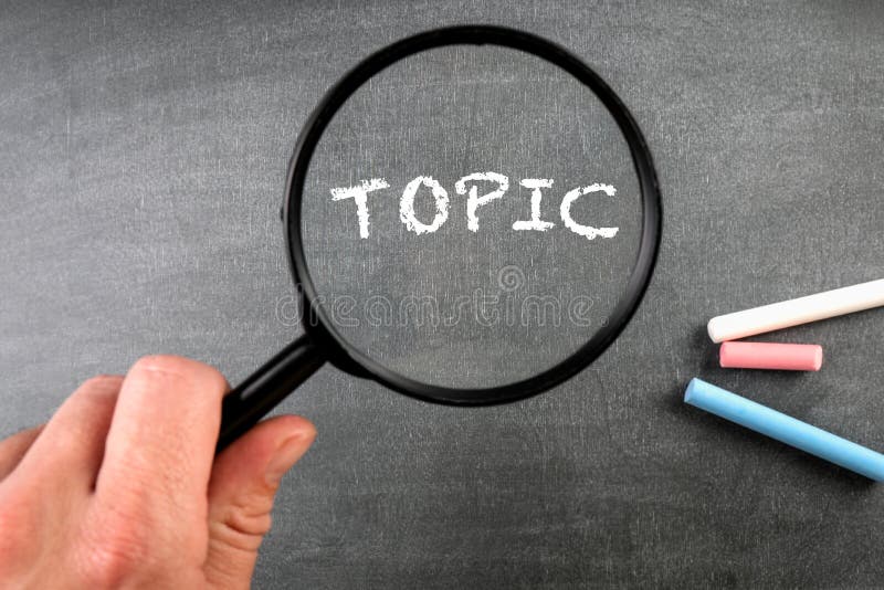 TOPIC. Text and Magnifying Glass on a Black Chalkboard Stock Photo ...
