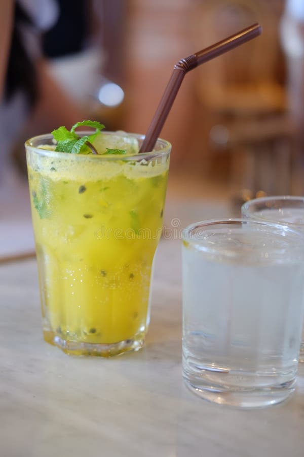 Topical Cocktail with Passion Fruit Lime and Mint Stock Image - Image ...