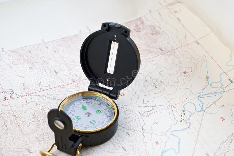 Topographical Map and Compass Stock Image - Image of paper, discovery ...