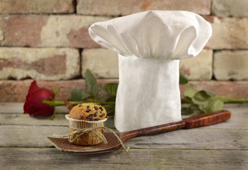Toque with Muffin and Red Rose Stock Photo - Image of culinary, copy ...