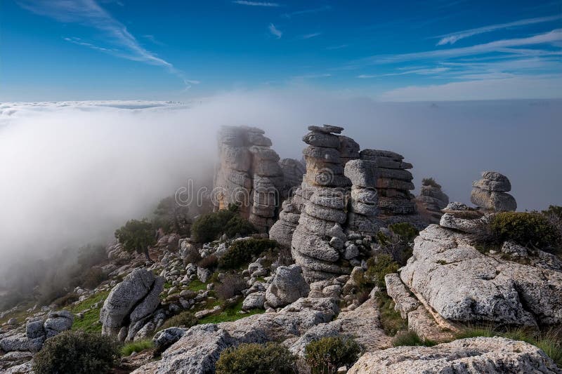 The Torcal De Antequera in the Mist Stock Photo - Image of people ...