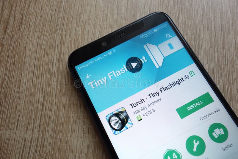 Torch - Tiny Flashlight App on Google Play Store Website Displayed on Huawei Y6 2018 Smartphone ...