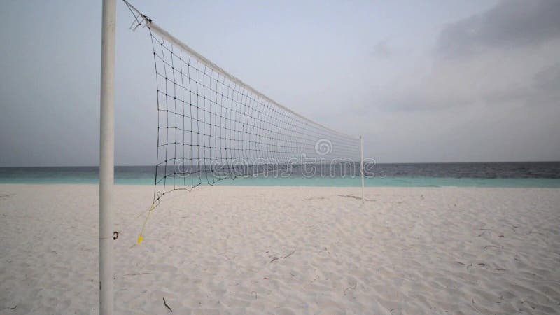 Torn Beach Volleyball Net at Tropical Beach Stock Footage - Video of ...