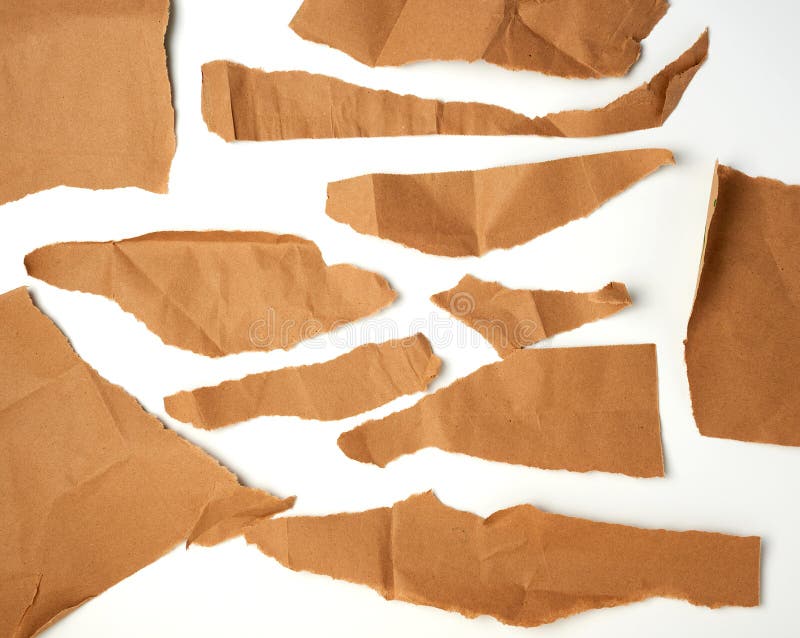 Torn Brown Pieces of Parchment Paper on a White Background Stock Photo ...