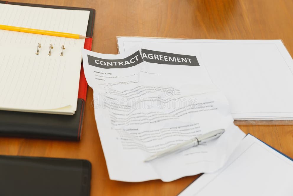 The Torn Contract Paper Placed on the Table after Negotiation Fails ...