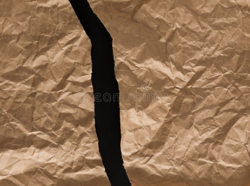 Torn Wrapping Paper Revealing Cardboard Box Stock Photo - Image of ...
