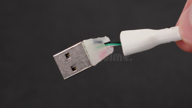 Torn Damaged Usb Cable in Hand. the Connecting Accessory of Charging is ...