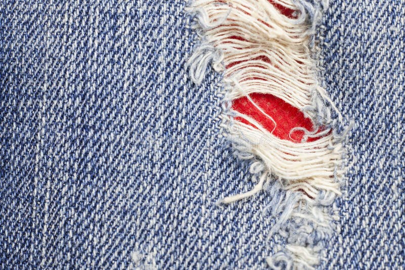 Torn denim jeans texture stock photo. Image of backdrop - 230899670