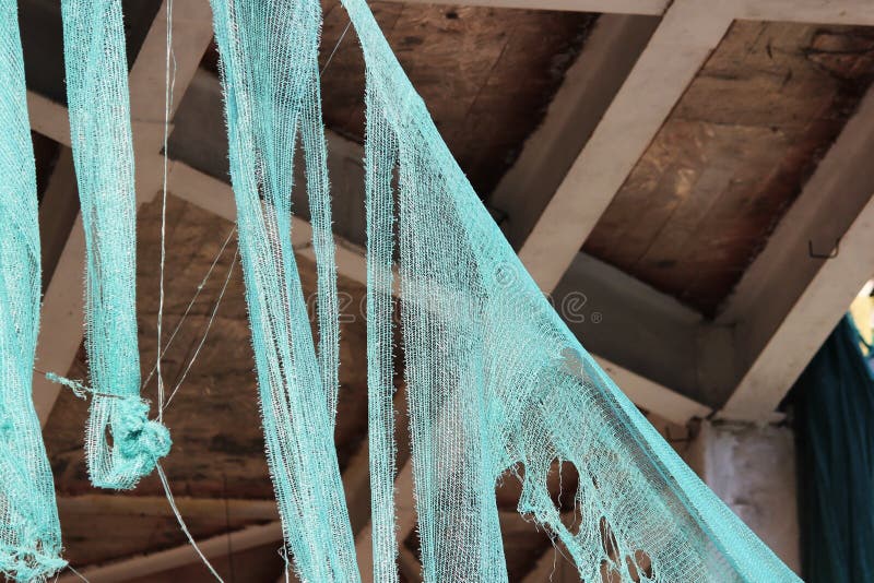 Torn Green Building Mesh on an Unguarded Unfinished Abandoned Building ...