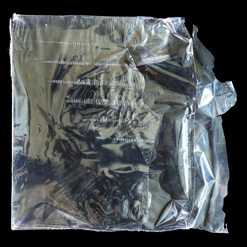 Torn Heat Shrink Plastic Wrap Packaging on Black Background Stock Photo ...