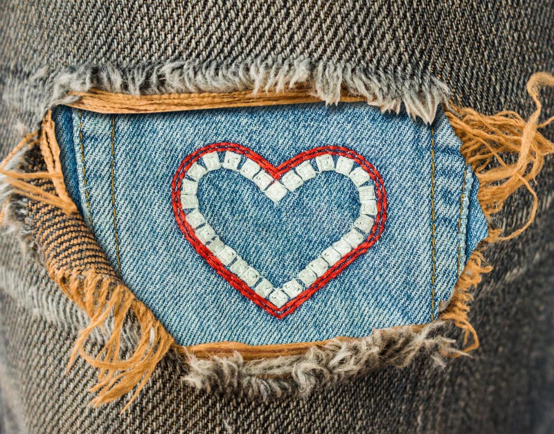 Torn Jeans a Heart-shaped Center Stock Photo - Image of pierced, casual ...